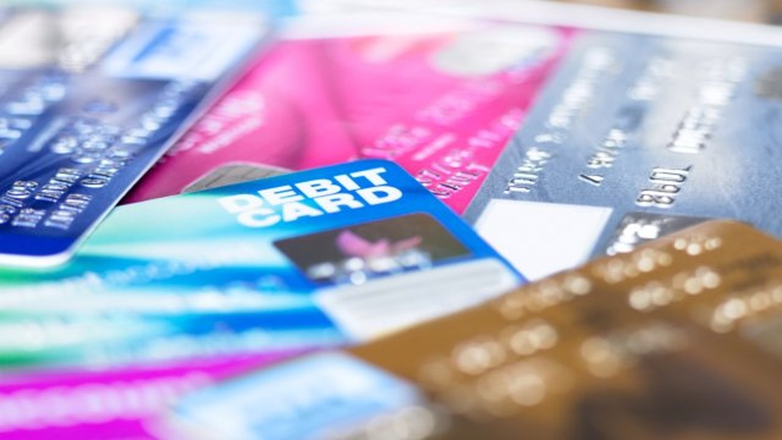 Debit and credit card spending down again in July