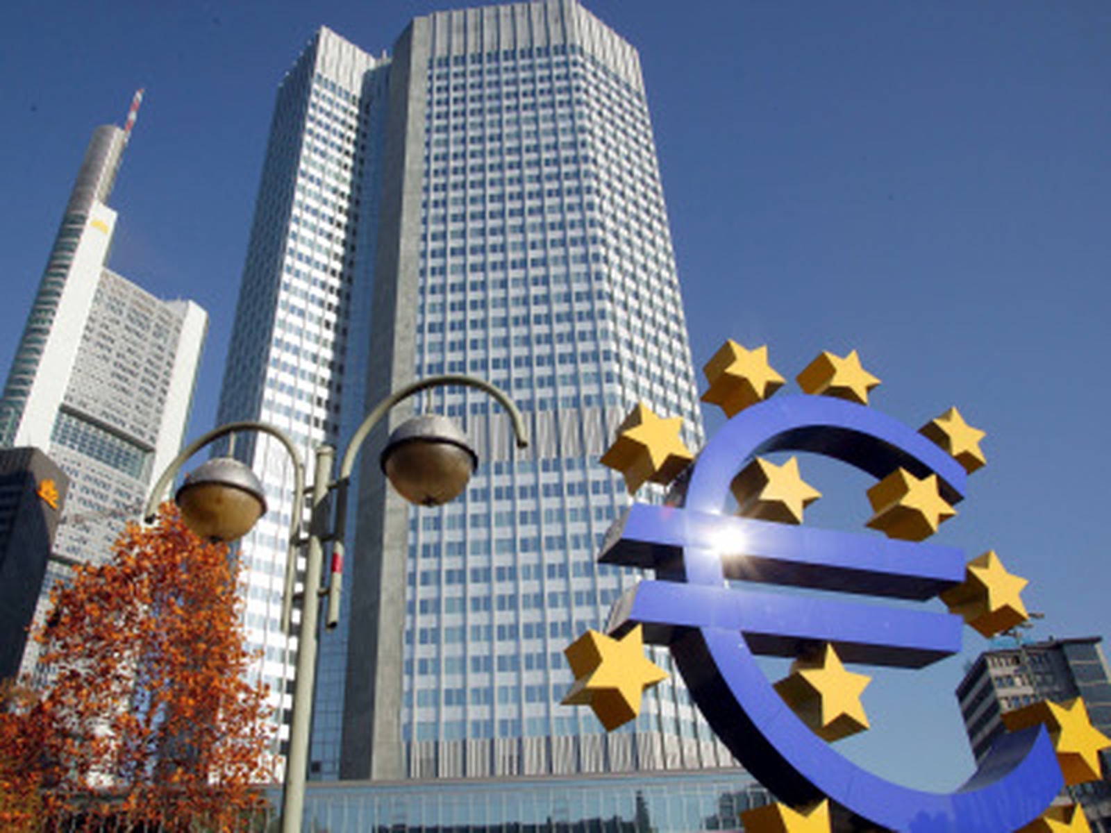 ECB revises forecasts as rates held
