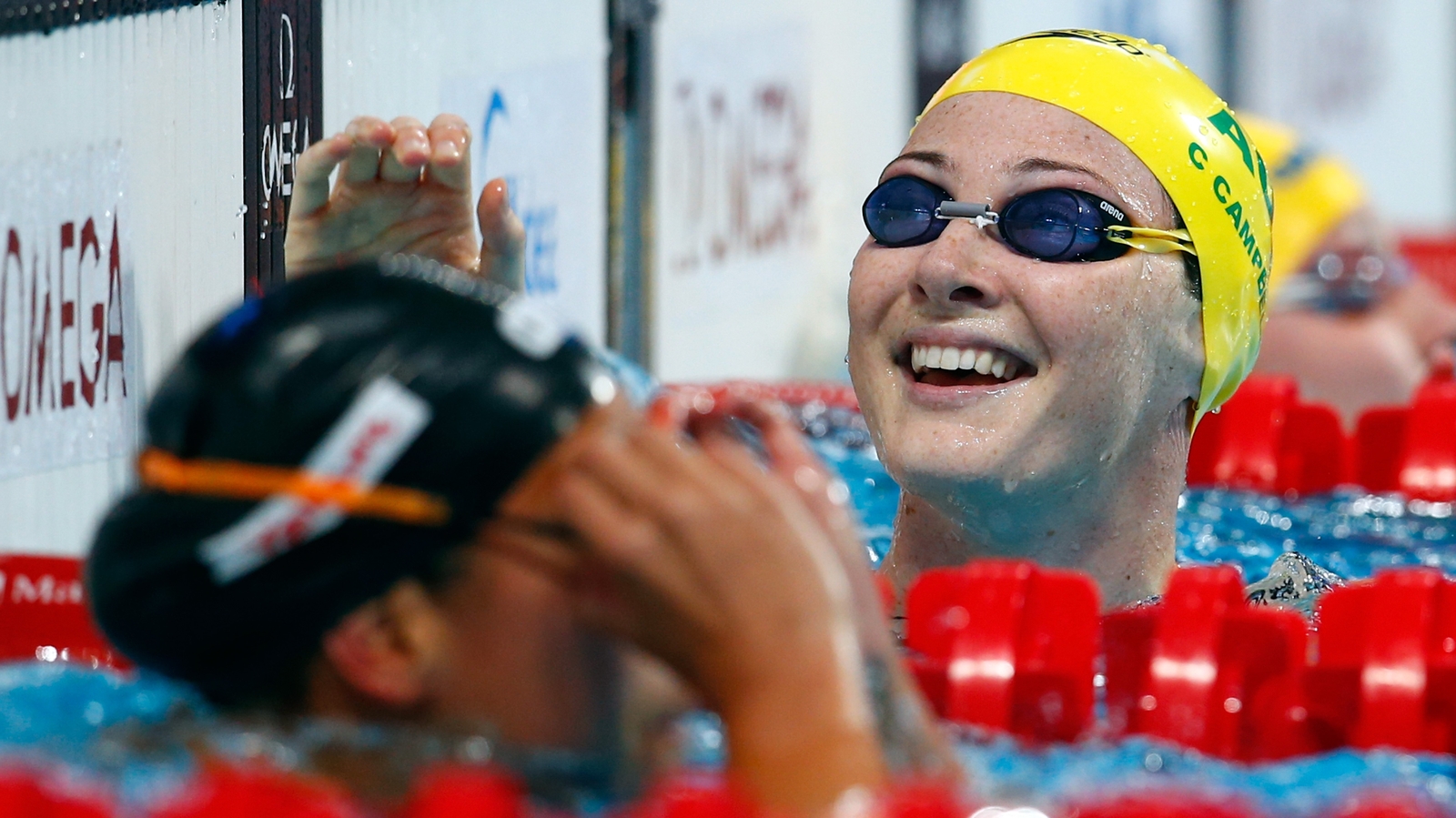 Swimmer breaks world record but finishes last