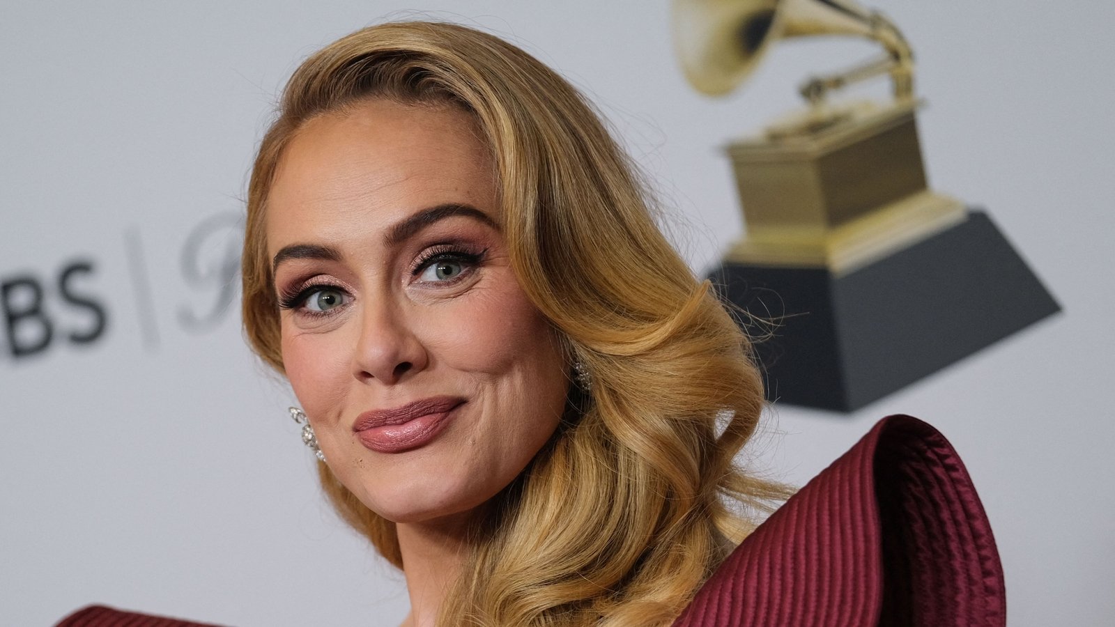 Hello? Don't throw stuff at us, Adele urges fans