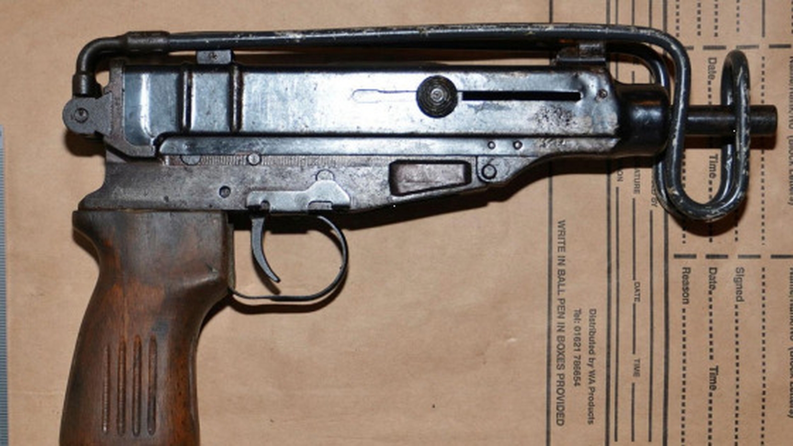 Six explosive devices and machine pistol found in Derry