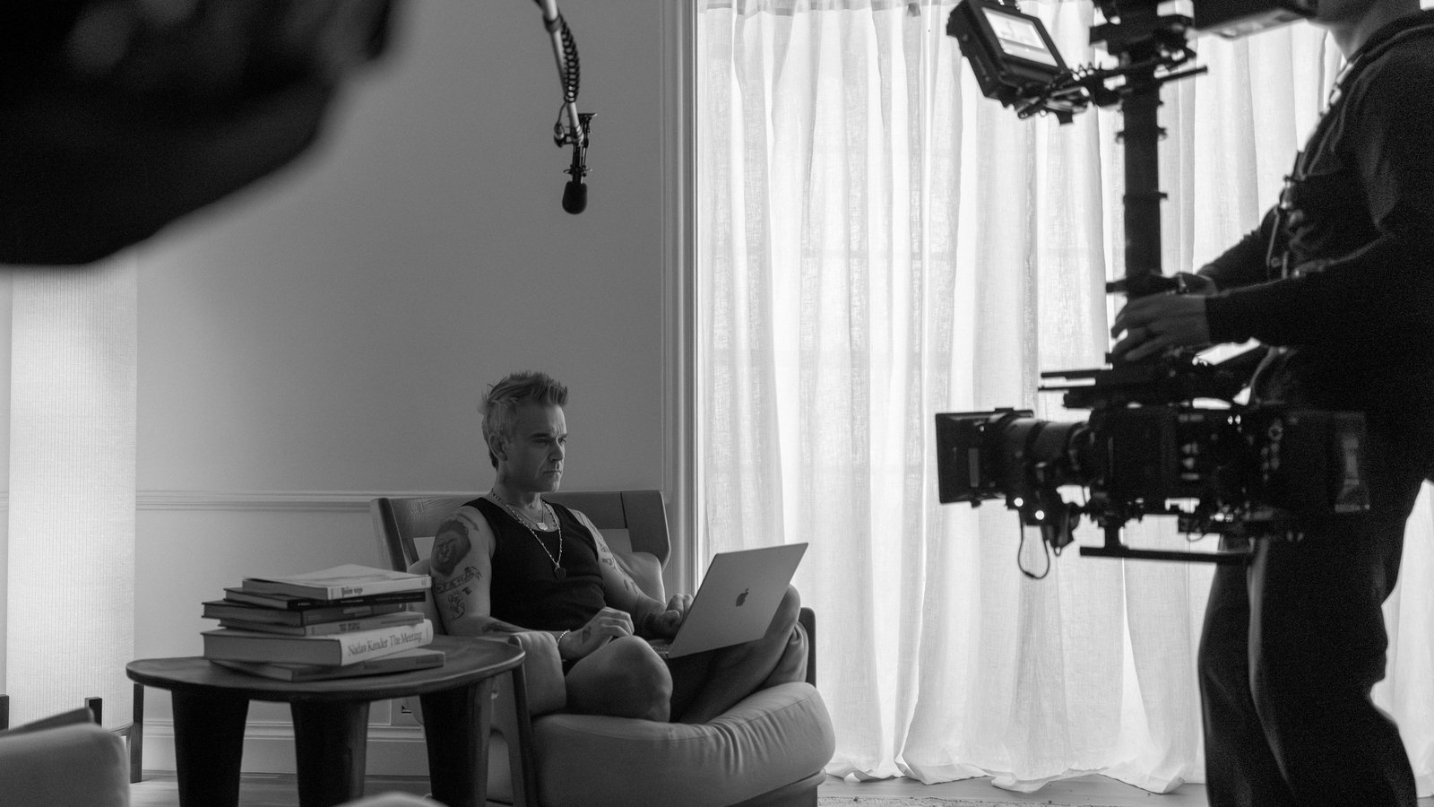 Robbie Williams movie review : Robbie Williams comes undone in new ...