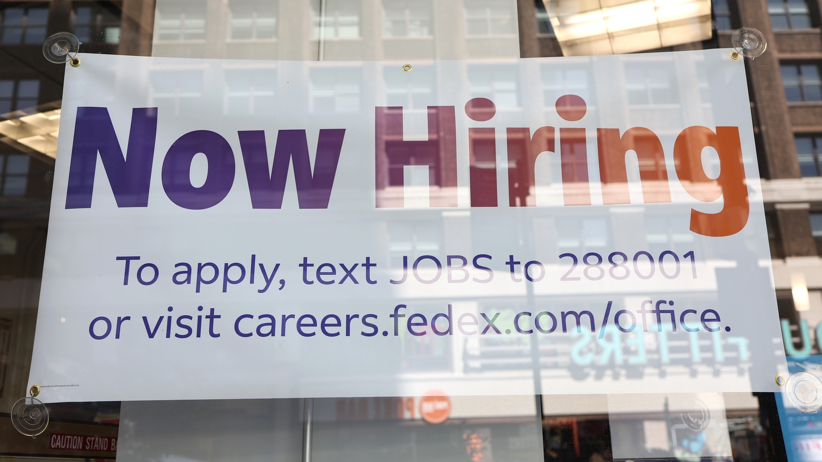 US weekly jobless claims rise moderately