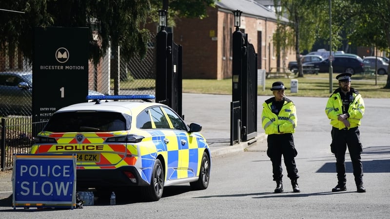 Two firefighters among 3 dead in former RAF base blaze