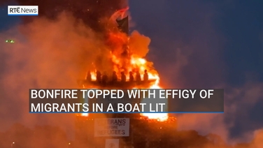 Video | Bonfire topped with effigy of migrants in a boat lit | RTÉ
