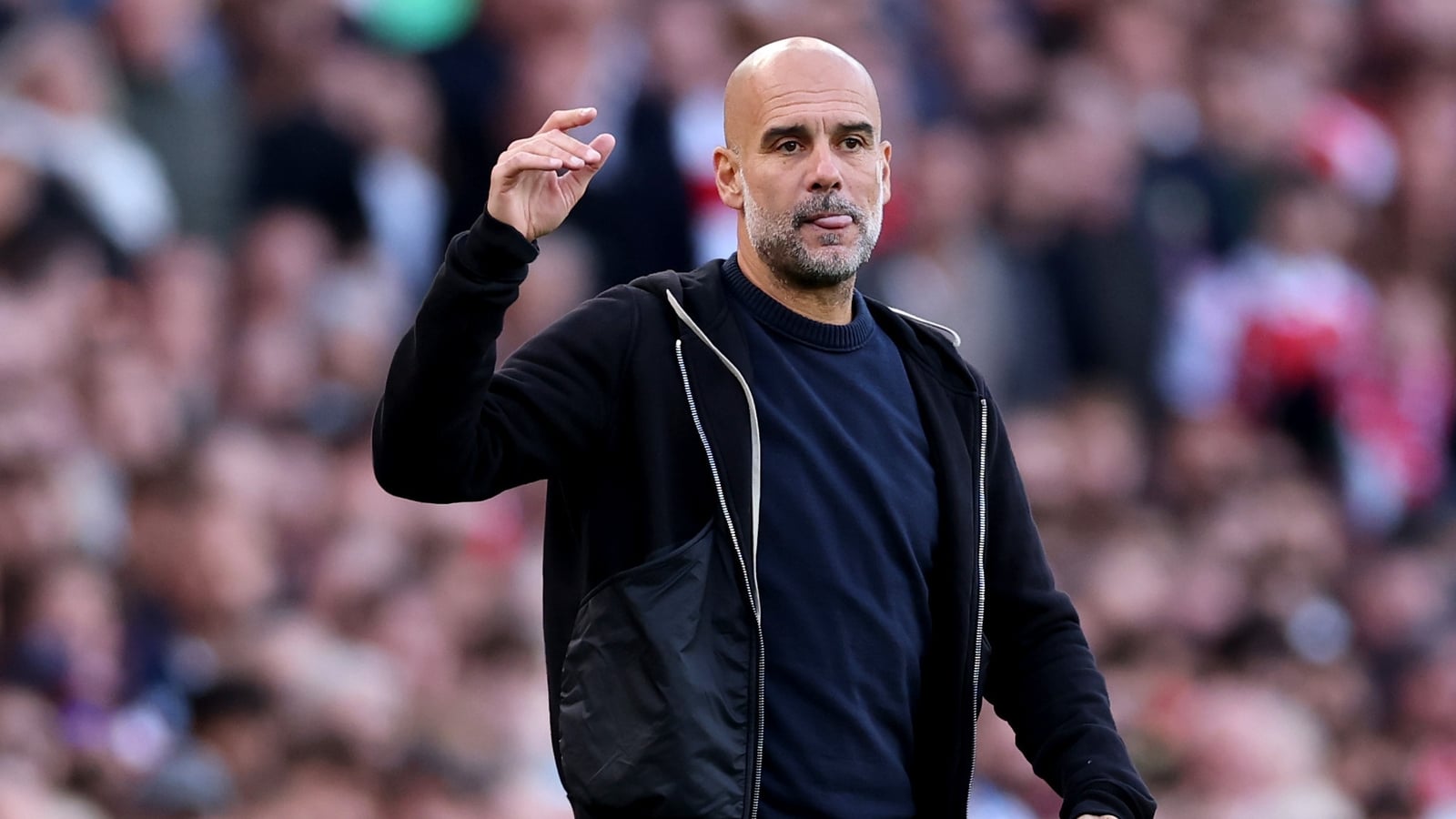 Guardiola defends City's defensive approach at Arsenal