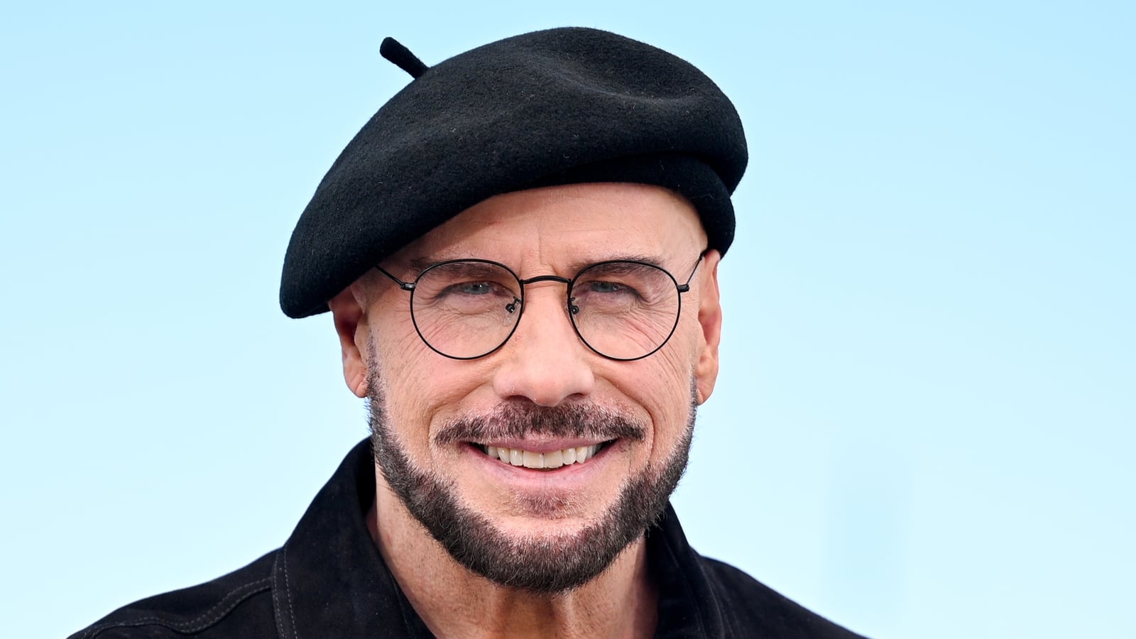Travolta unsure he will direct again after Cannes debut